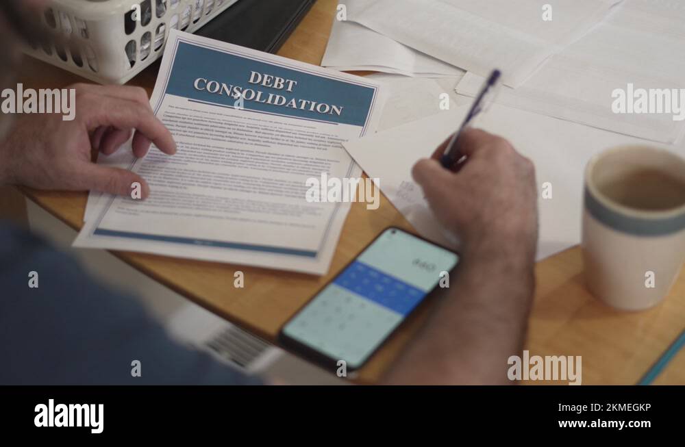 Calculating debt Stock Videos & Footage - HD and 4K Video Clips - Alamy