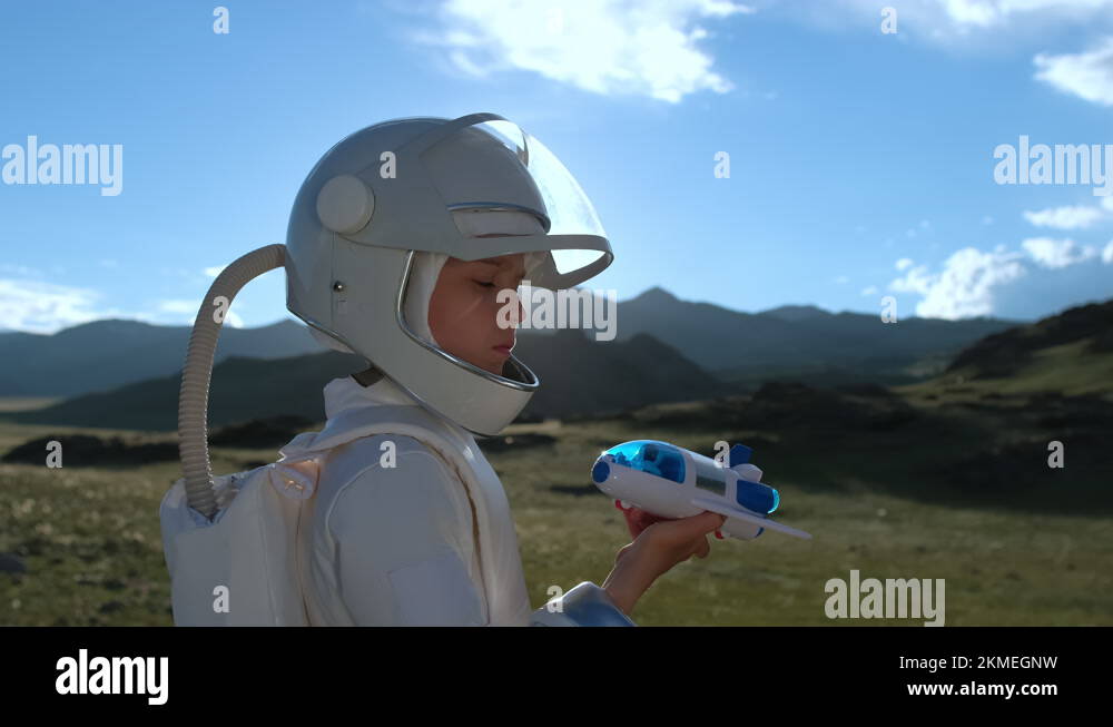 Little young happy child boy wearing astronaut uniform and helmet ... Little young happy child boy wearing astronaut uniform and helmet ...