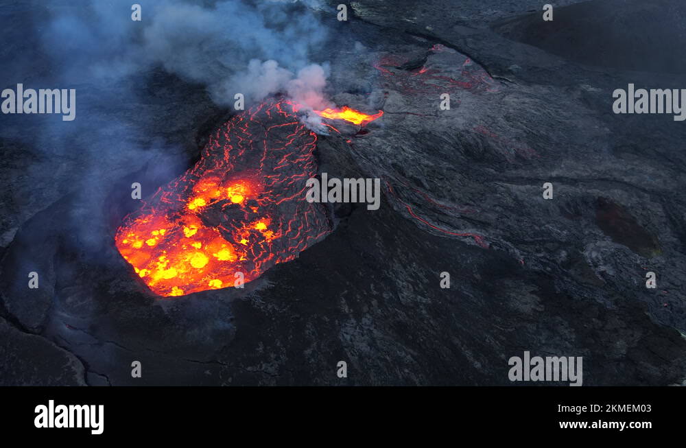 Drone shoot flying around smoking Iceland Geldingadalir Volcano ...