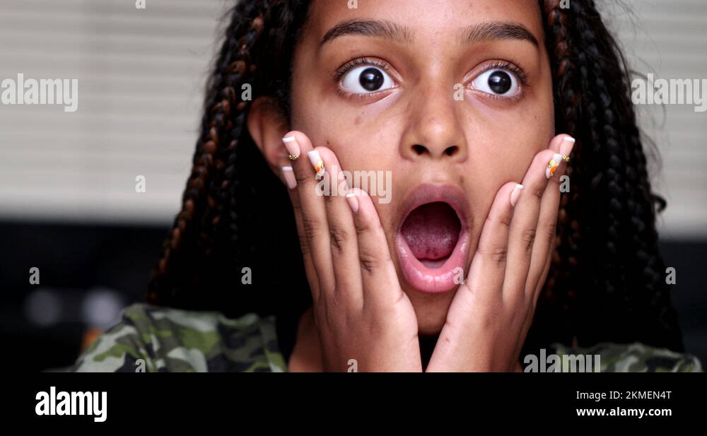 Excited child shocking reaction. girl reacts with surprise with open mouth Stock Video Footage ...