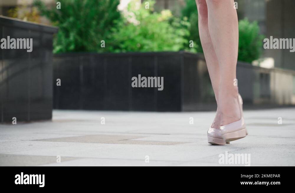 Close-up Unrecognizable Sexy Female Feet in High Heels Walking Along ...