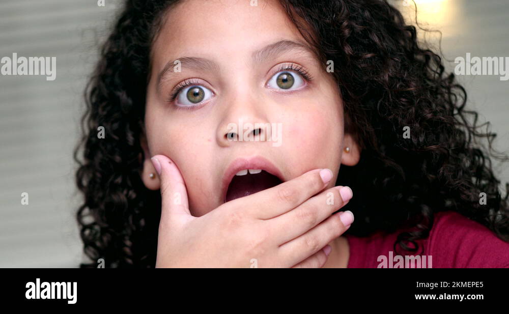 Scared little girl child portrait SHOCKING reaction Stock Video Footage - Alamy