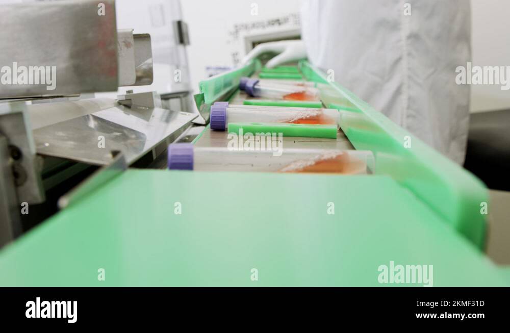 Automated manufacturing of Covid-19 test tubes in a clean room Stock ...