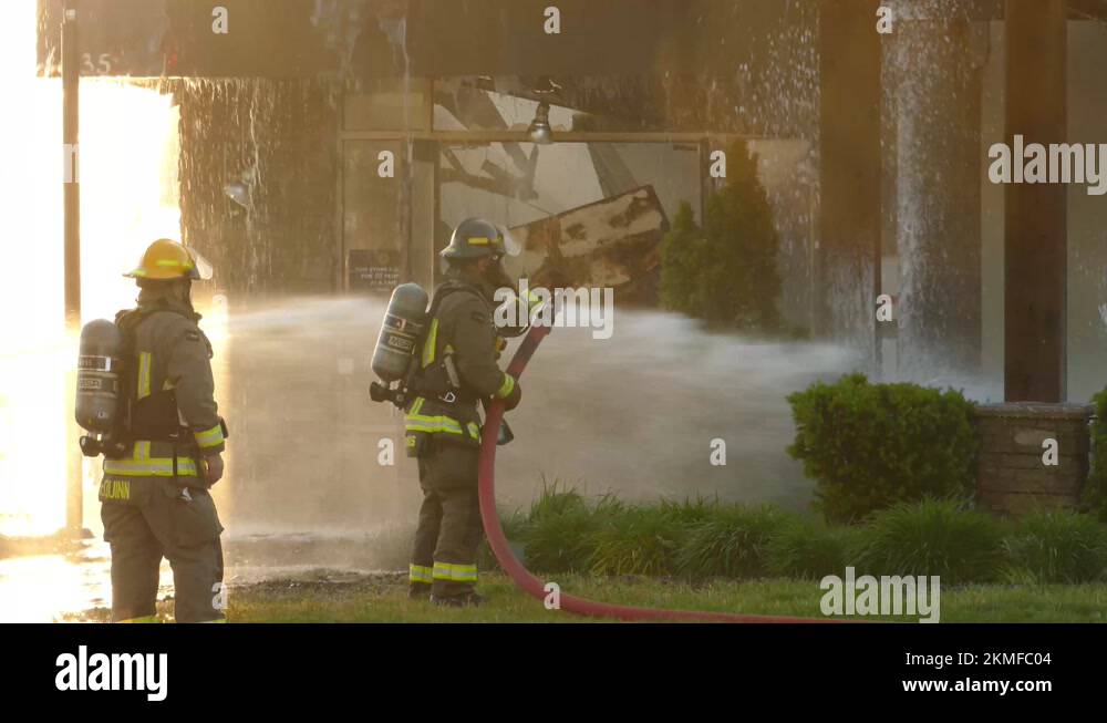 Live rescue - Firefighters wearing full Personal Protective Equipments ...