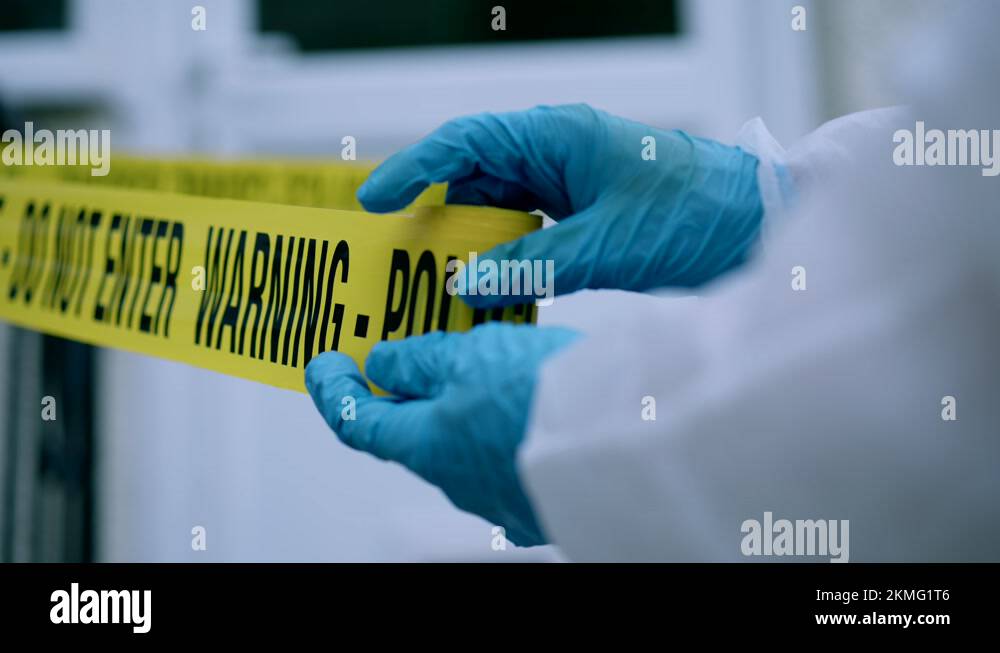 CSI Unravel Barricade Tape 'Do Not Cross' At Crime Scene Outside In ...