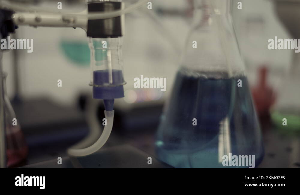 Chemical laboratory with flasks and test tubes. Chemical process with ...