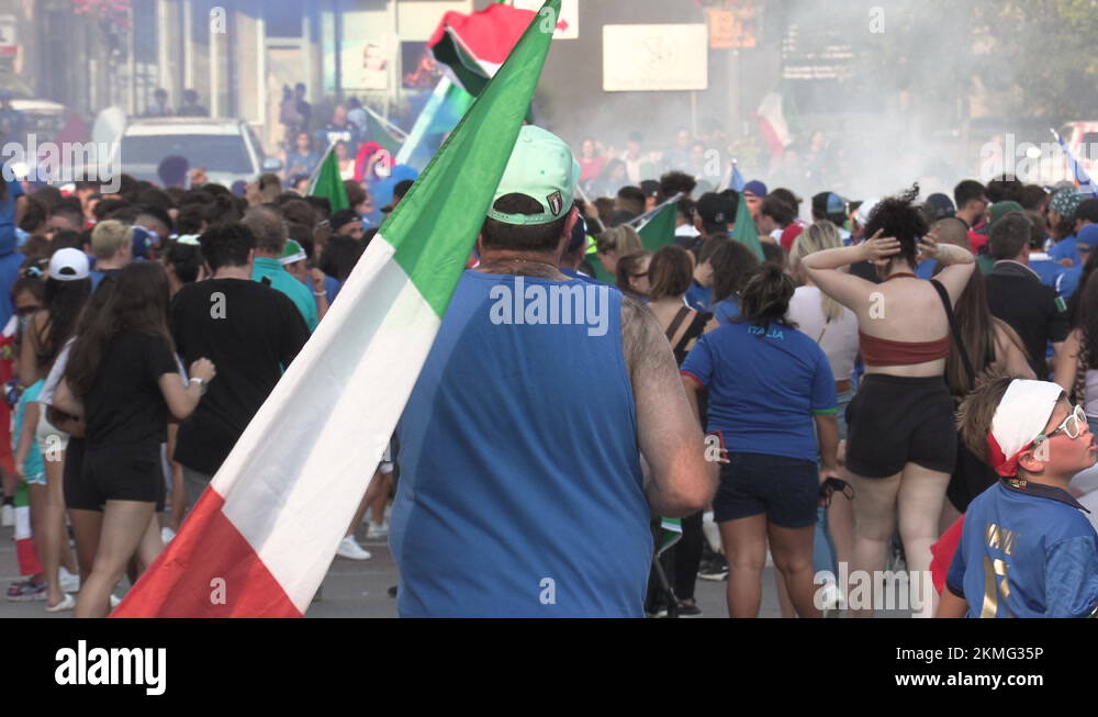 Teenage Italian soccer fans celebrate victory after Italy wins Euro cup ...