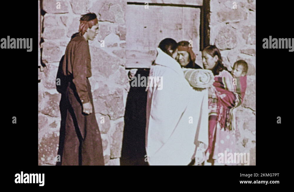 1960s: Hopi bride follows father and mother in weding ceremony. Bride ...
