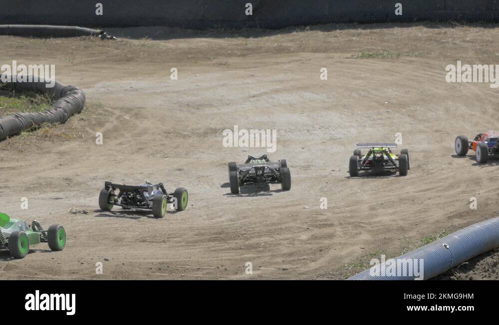 Electric radio control buggies seen staging and launching during a race ...
