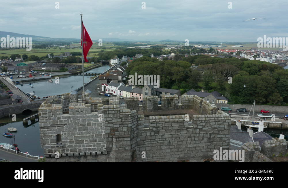 flying counter clock around flag atop Castle Rushen in Castletown Isle ...