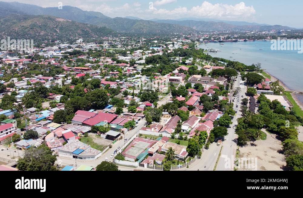Rising drone footage of Dili, the Capital of Timor Leste in South East ...