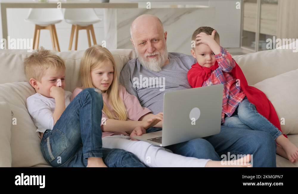 Happy family generations, elderly gray-haired grandfather with two ...