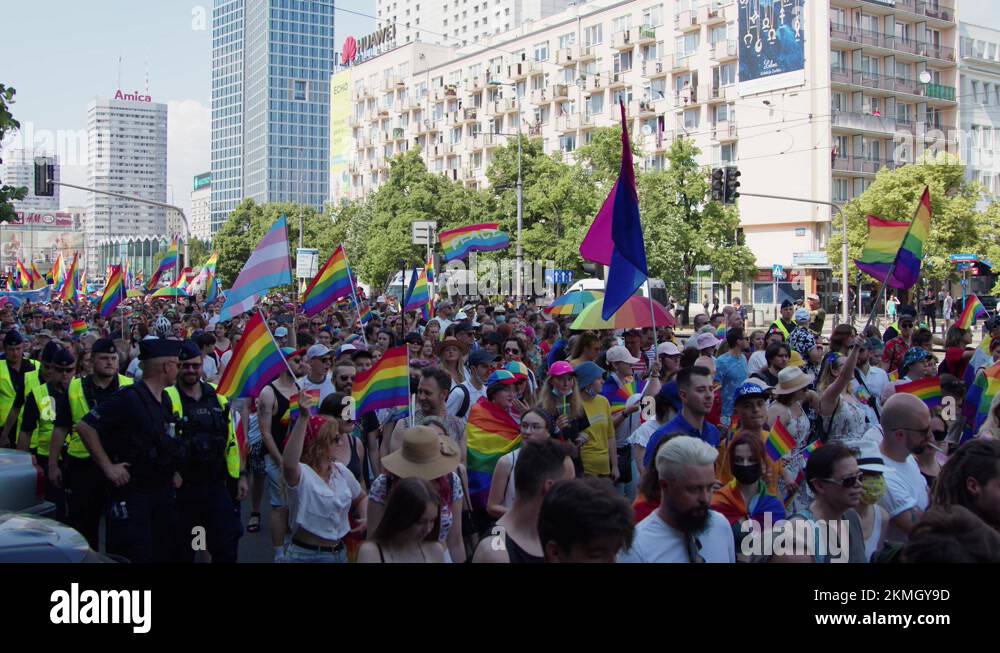 LGBTQ Pride Parade - People With Rainbow Flags Claiming The Rights Of ...
