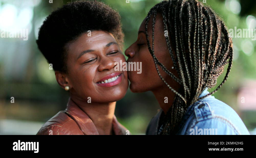 Cheek kissing women Stock Videos & Footage - HD and 4K Video Clips - Alamy