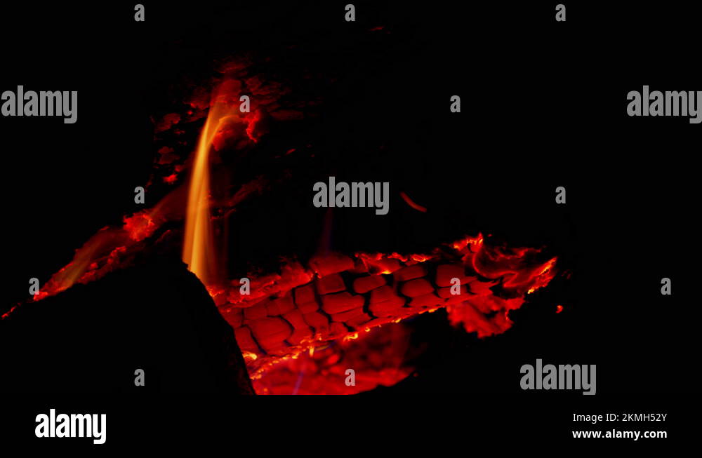 Bonfire burning at night. Flying embers from fire slow motion. Burning ...