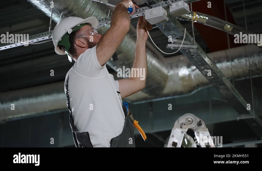 Installation of electrical system inside industrial building Stock ...