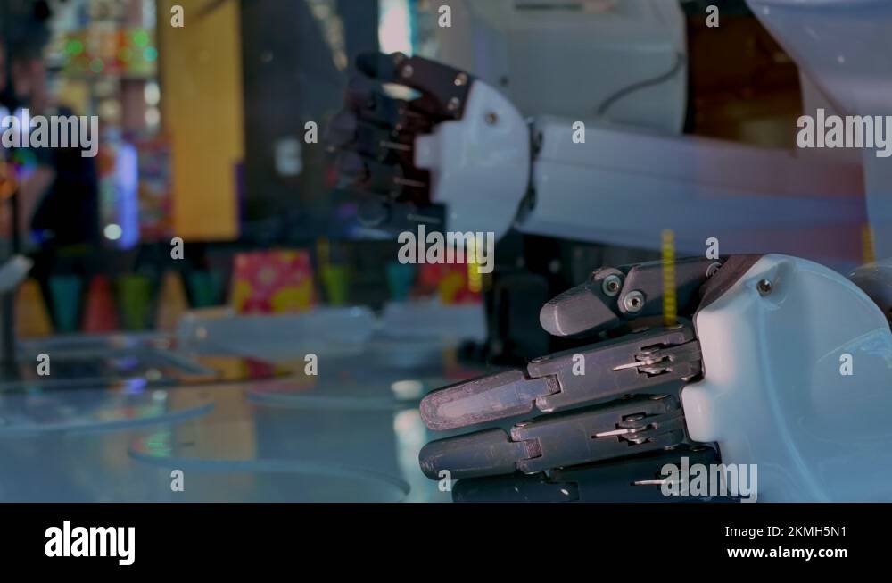 Robots serve visitors. Robotic arms with functions similar to the human ...