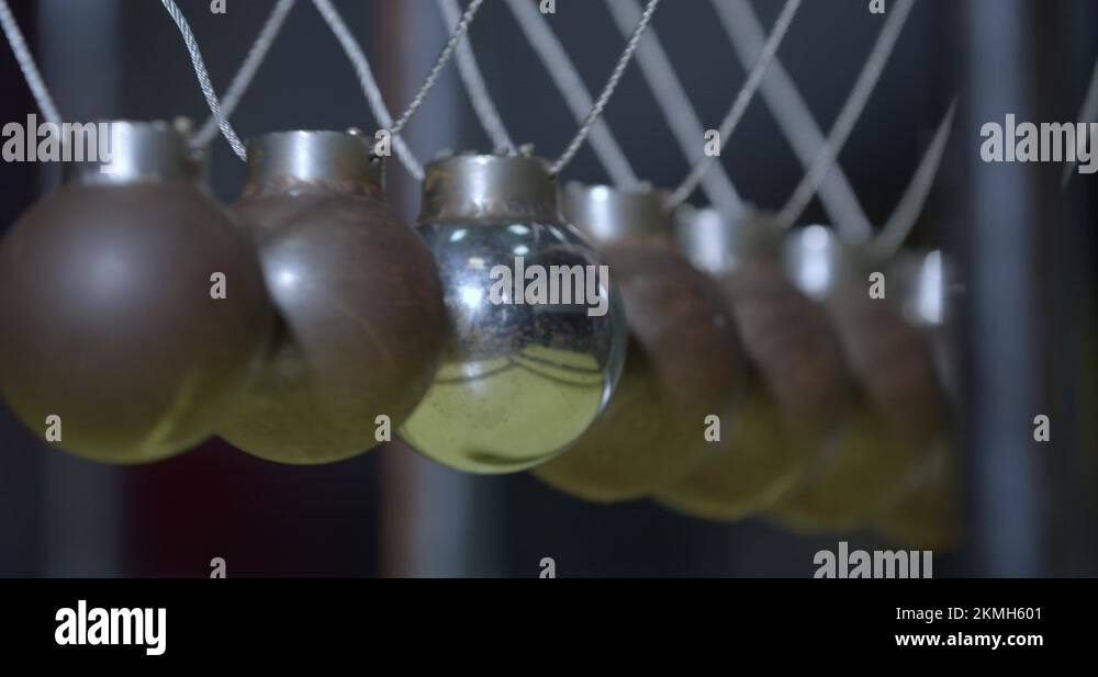 Close up footage of the kinetic balls in action, swinging and hitting, 4k Stock Video Footage ...