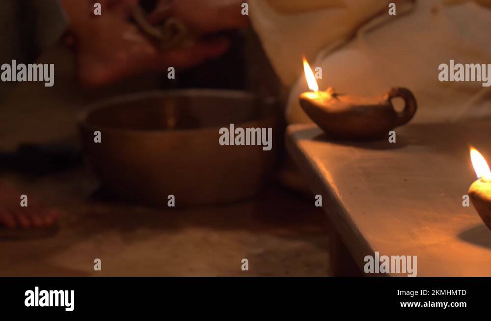 Jesus washes His disciples' feet under the light of an ancient retro ...