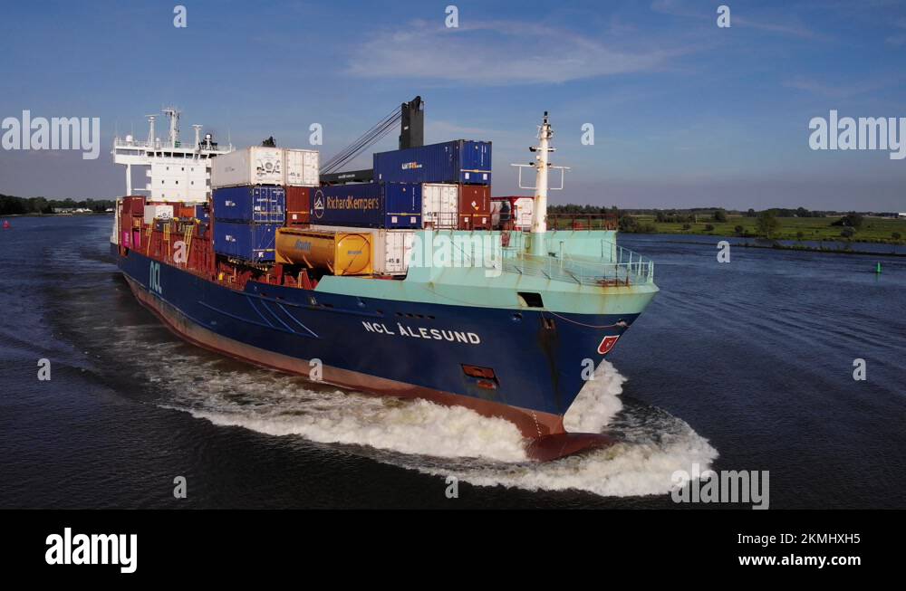 Shipping Vessel Of NCL Alesund With Intermodal Containers Sailing At ...