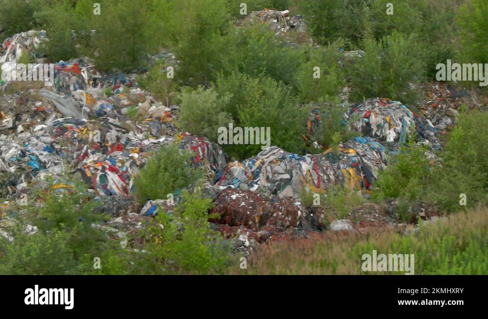Household waste dumped in the countryside, polluted environment, aerial ...