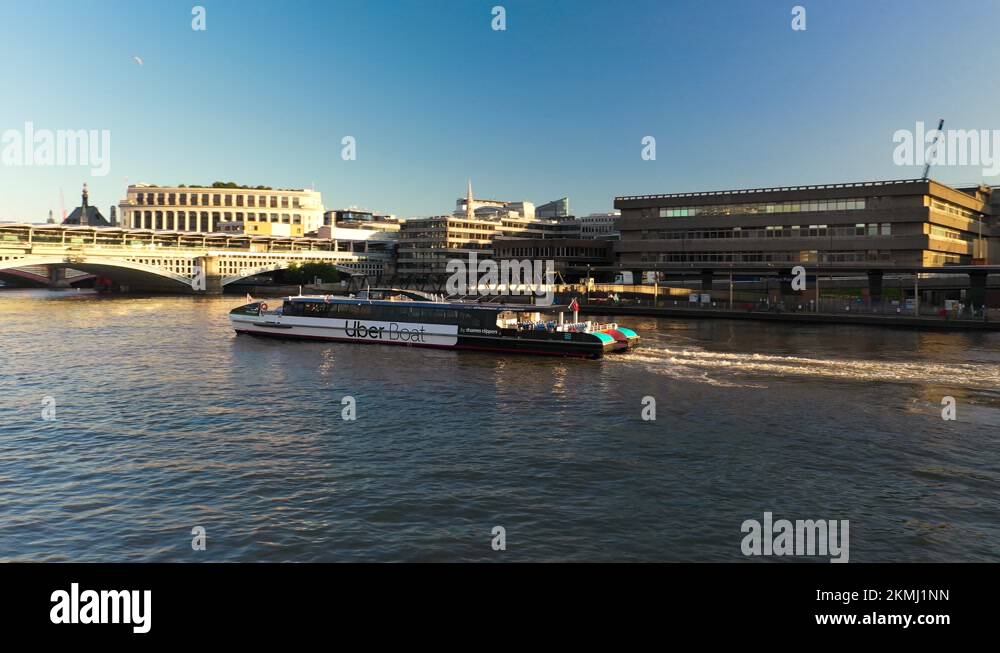 Boat floating on Thames river at Blackfriars Railway Bridge Stock Video ...