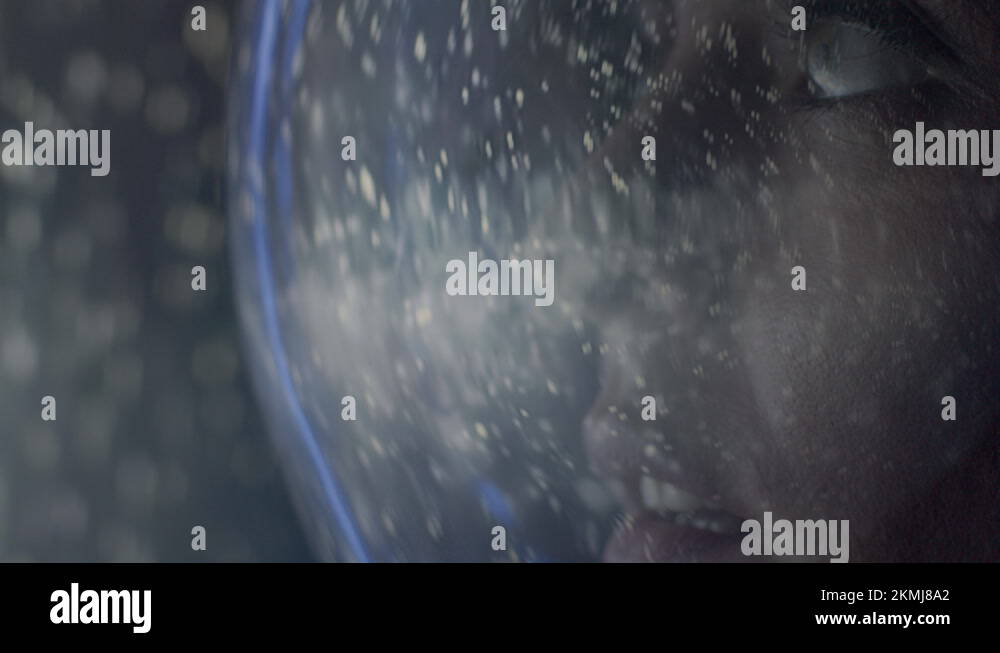 Woman wearing astronaut helmet in outer space, cosmos sky exploration ...