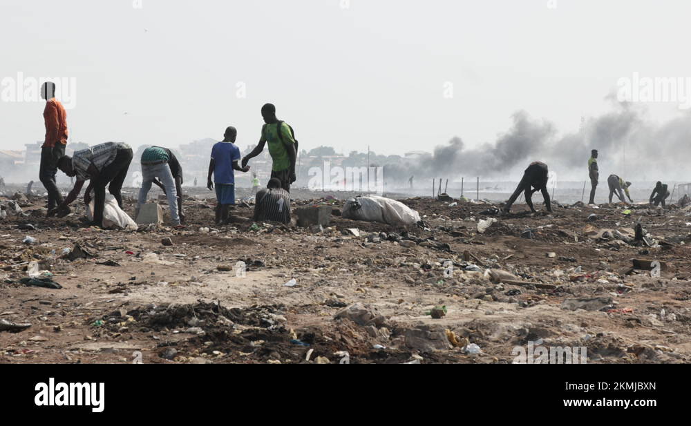 Extreme poverty men digging toxic garbage Accra Ghana 4K Stock Video ...