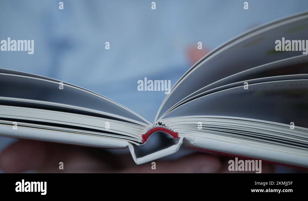 Hands Turning the Pages of a Book. One Person Reading, and Learning ...