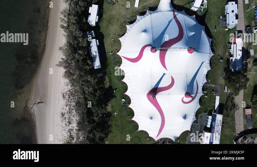 Architecturally designed circus big top tent structure built next to a ...