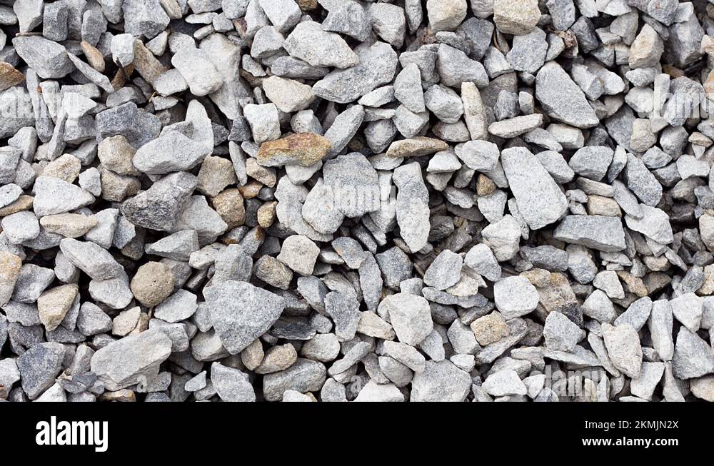 texture of small black rubble lying on the ground, close-up Slow motion ...