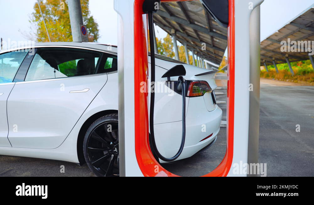 Tesla car charging Stock Videos & Footage - HD and 4K Video Clips - Alamy