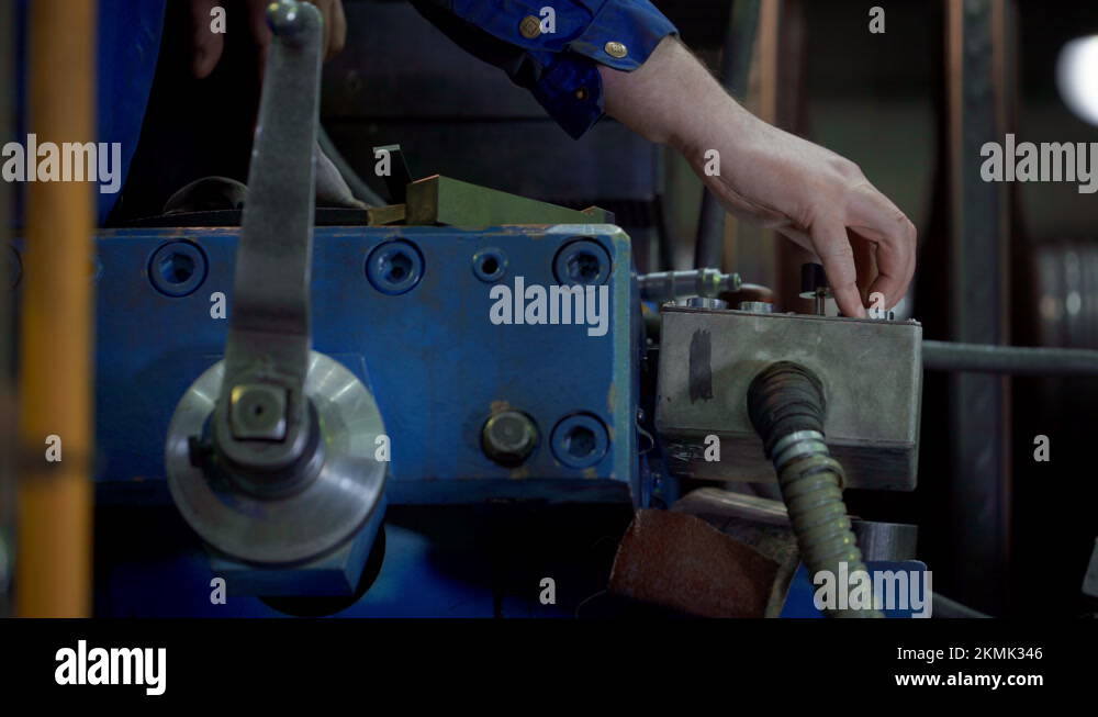 A Worker is Moving the Lever and Pushing Buttons on Control Hub at ...