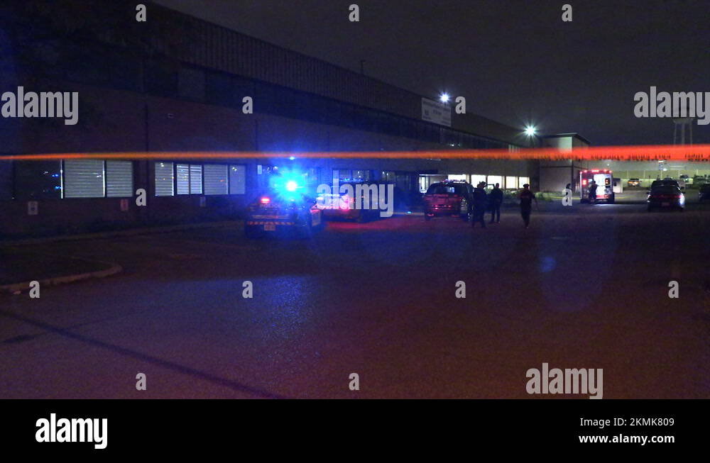 Multiple police cars at night with emergency lights flashing at crime ...