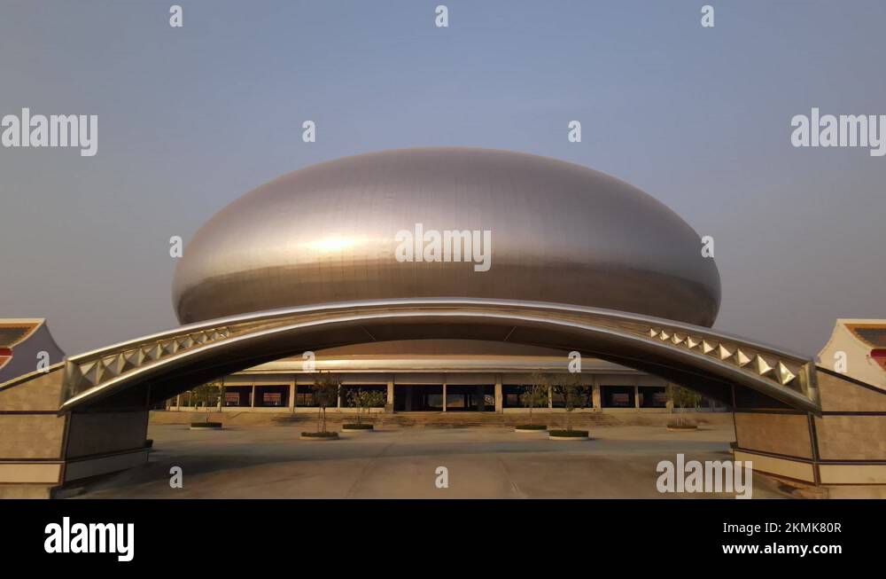 4K aerial drone flying under the arch toward the giant ellipsoid dome ...