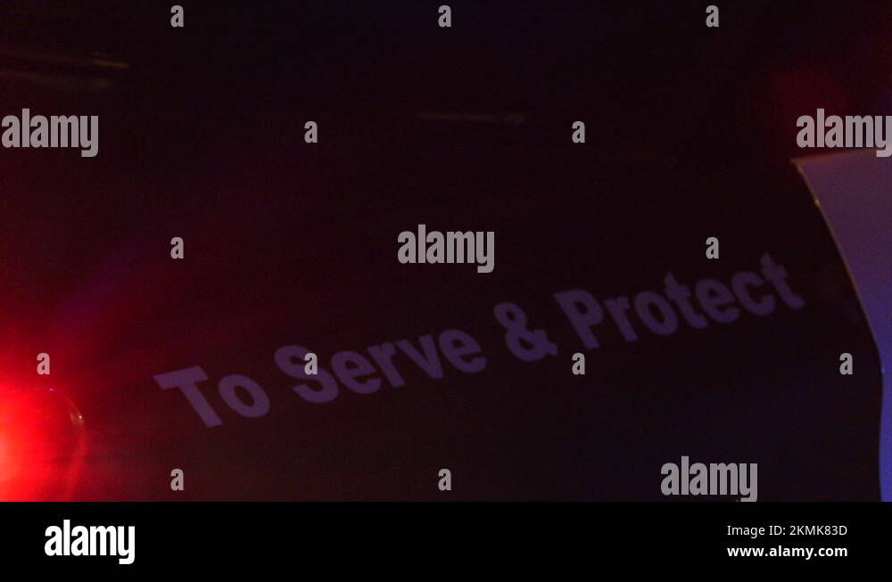 Multiple police cars at night with emergency lights flashing at crime ...