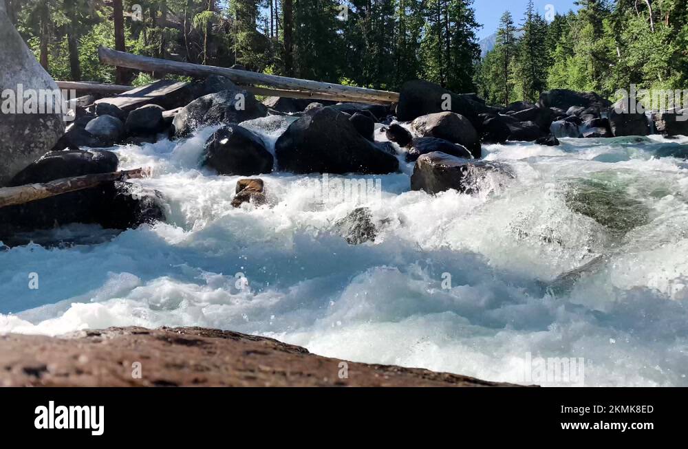 Cold, rushing water of Icicle Creek, Leavenworth, Washington State ...