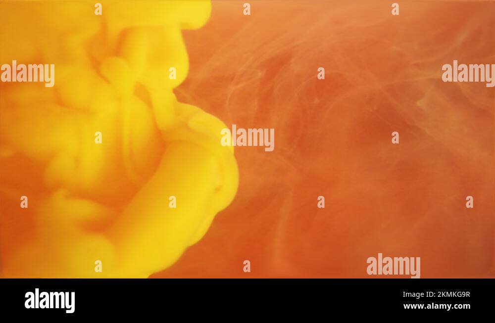 Drops of ink dripping into water, curved patterns. Background with ...