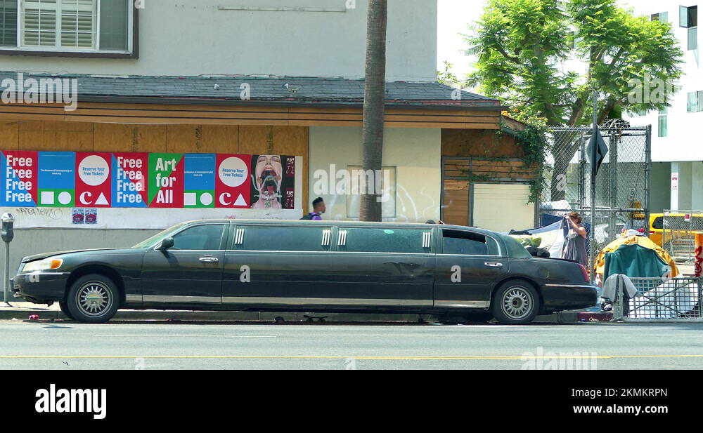 Homeless woman living in abandoned Limousine and tent during in Los ...