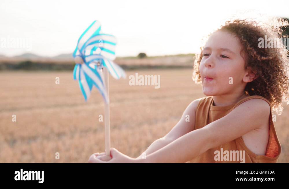 Kid girl blowing windmill Stock Videos & Footage - HD and 4K Video ... Kid girl blowing windmill Stock Videos & Footage - HD and 4K Video ...