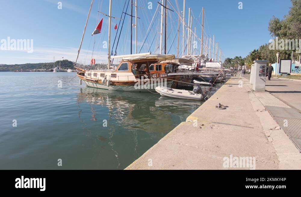 Traditional wooden vessel Turkish Gulets dock at Bodrum marina harbour ...