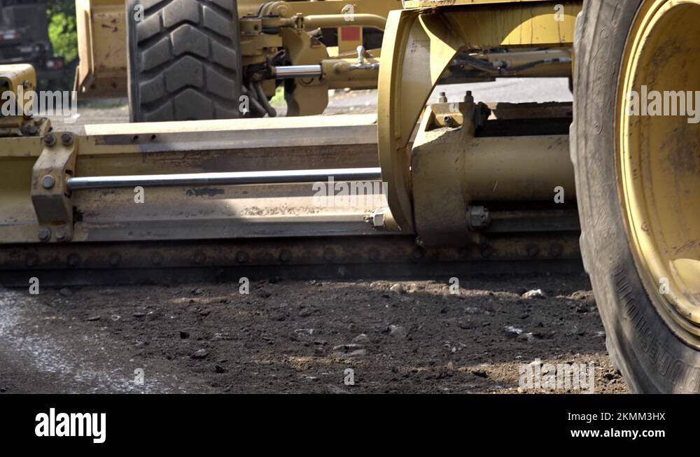 Heavy machine for road construction at work in slow motion Stock Video ...