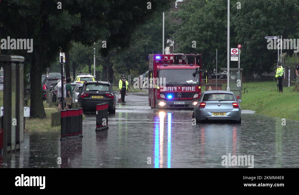 Fire engine in flood water Stock Videos & Footage - HD and 4K Video ...