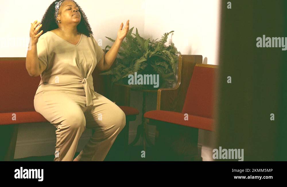 Woman praising god Stock Videos & Footage - HD and 4K Video Clips - Alamy