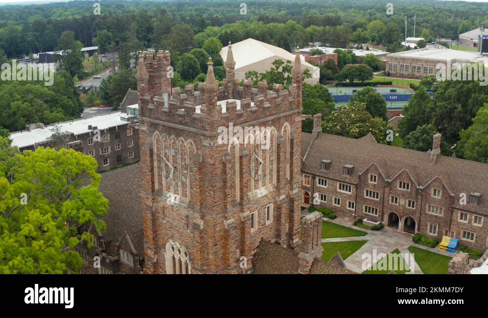 Aerial of Duke University campus tower. Gothic architecture and tennis ...