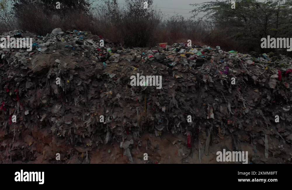 Huge piles of plastic trash and other garbage by roadside Stock Video ...