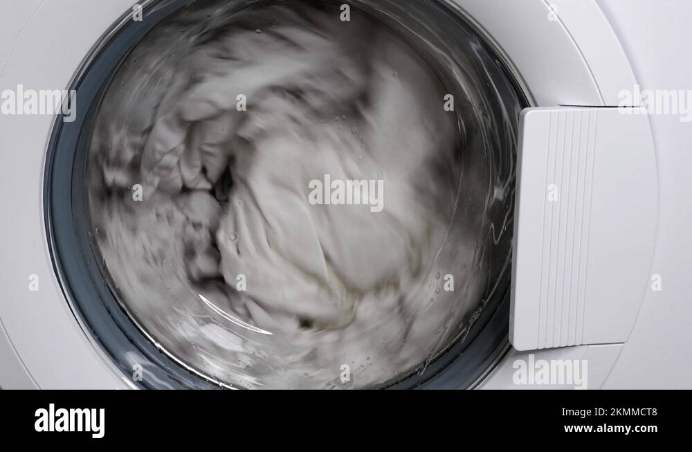 Washing clothes in a washing machine. 4k Stock Video Footage - Alamy
