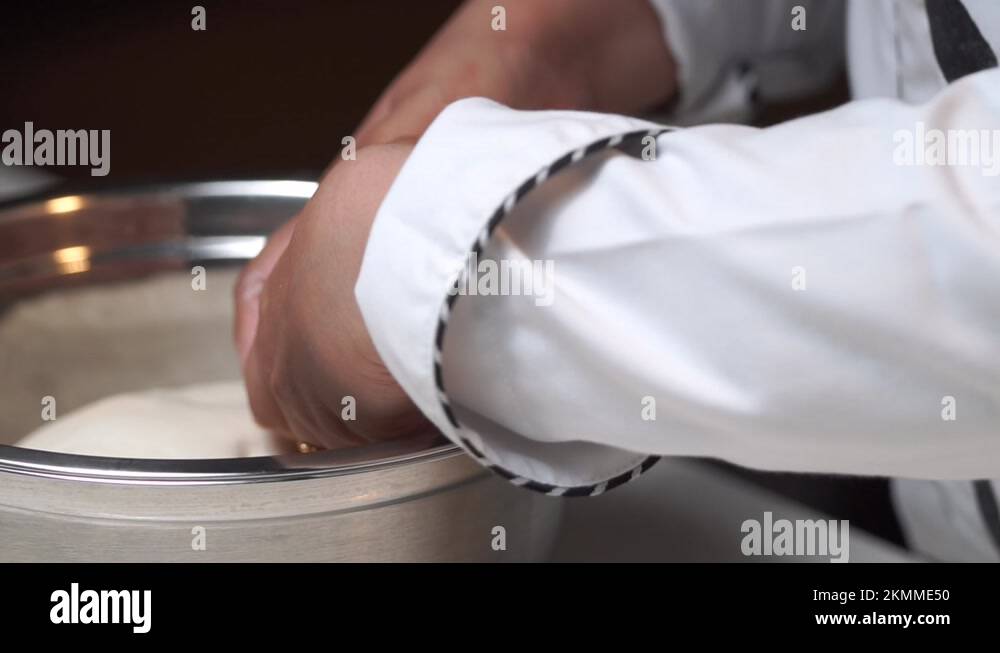 kneading white dough with hands placing for resting formenting Stock ...