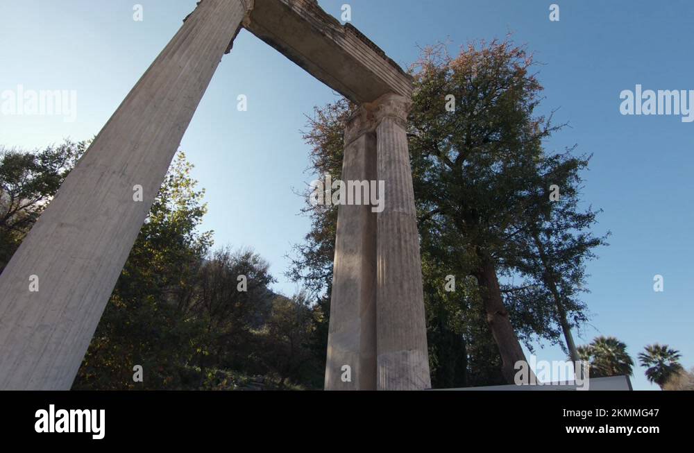 Cinematic orbit shot from Hadrian’s Gate revealing the Library of ...