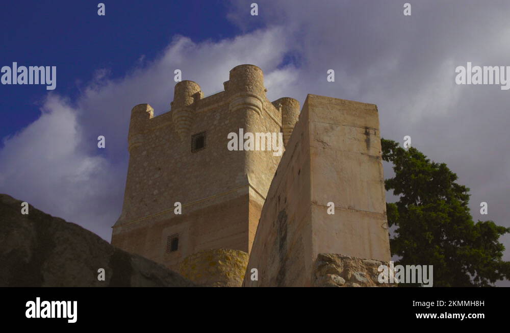 Low angle time-lapse view of The Atalaya Castle where clouds are moving Stock Video Footage - Alamy